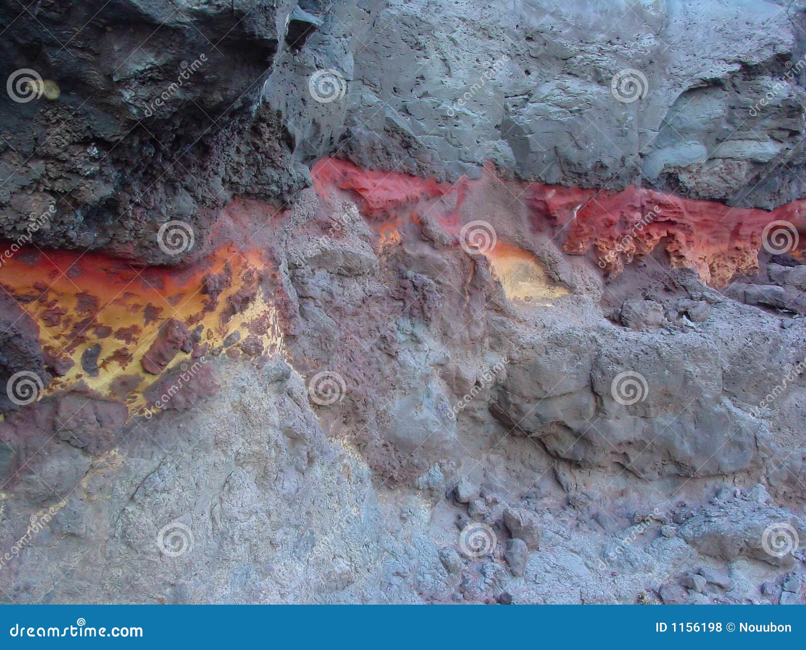 A Volcano S Lava Flow Shows Colorful Rock Layers. Stock Photo - Image ...
