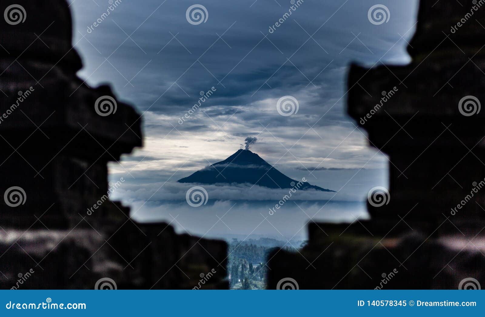 Volcano view from a temple stock image. Image of temple - 140578345