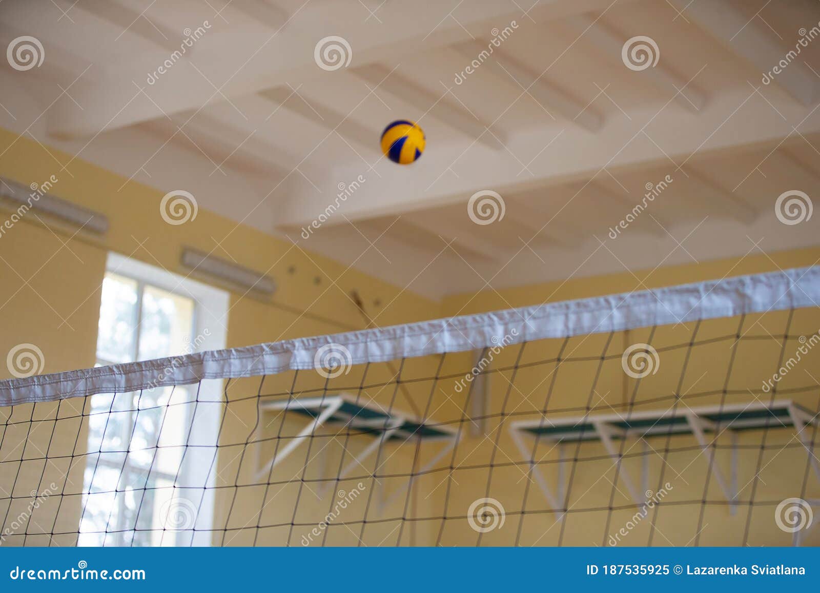 A Volleyball Ball Flies Over the Net. Stock Image - Image of equipment ...