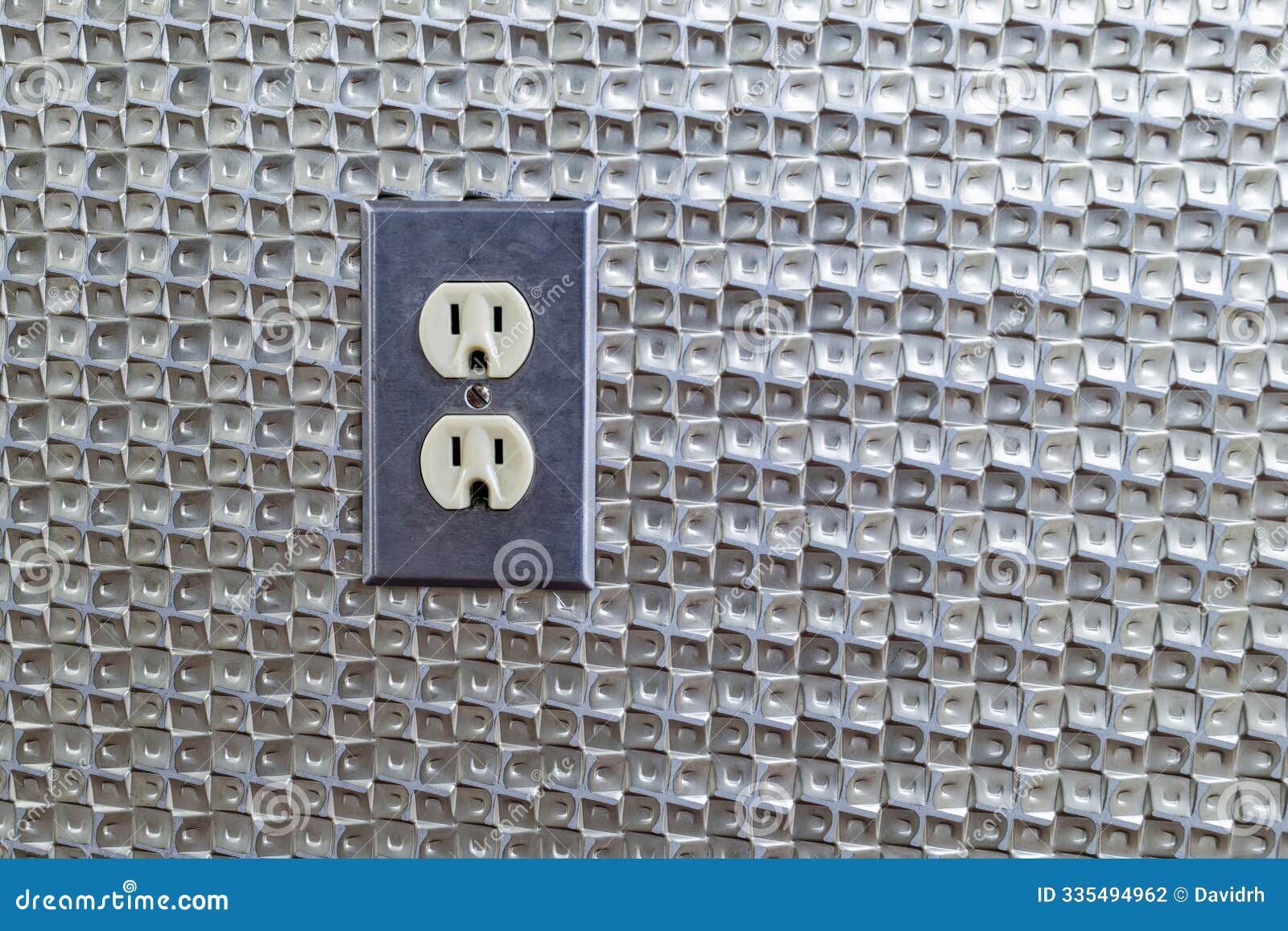 A 120-volt Duplex Electrical Outlet on a Textured Metal Wall Stock ...