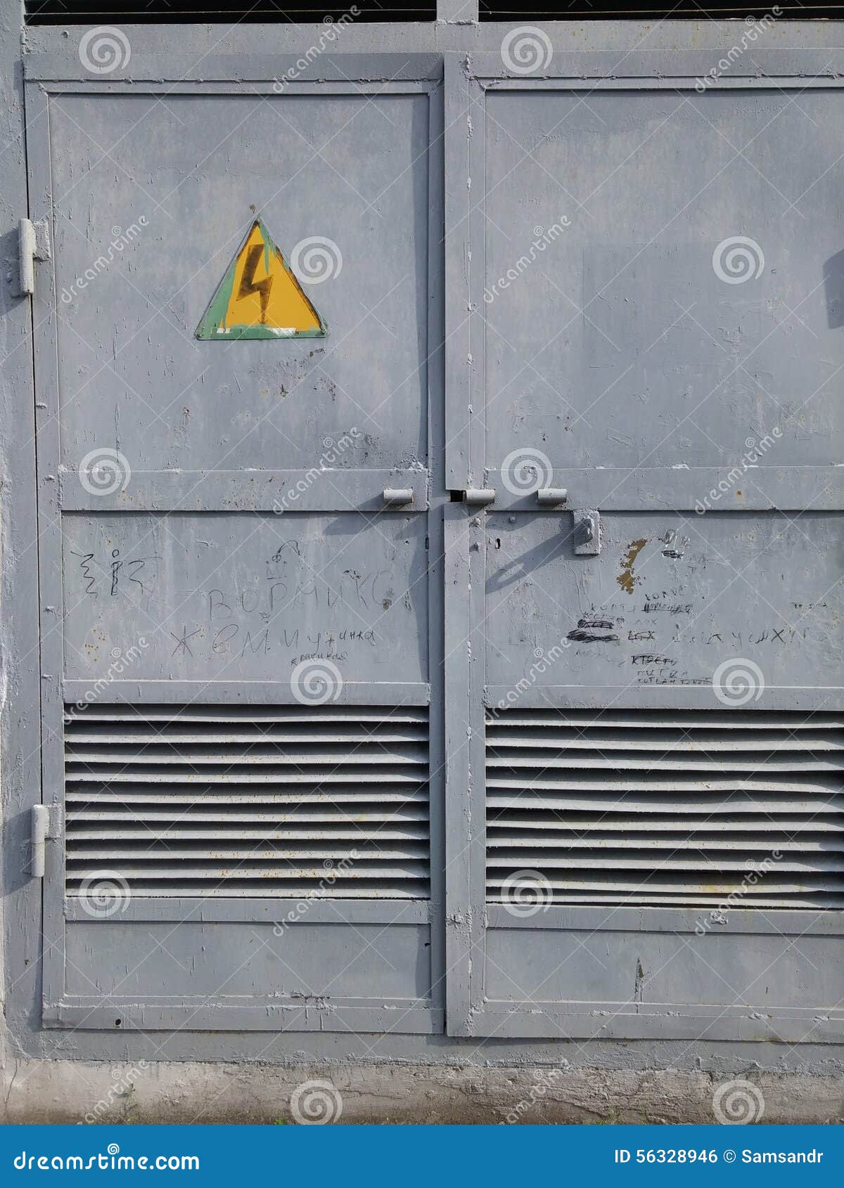 Voltage sign on metal door stock photo. Image of danger - 56328946