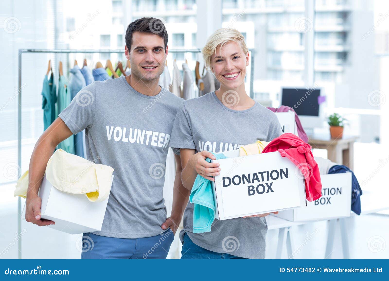 Volunteer Couple Holding Donation Boxes Stock Photo - Image of donating ...