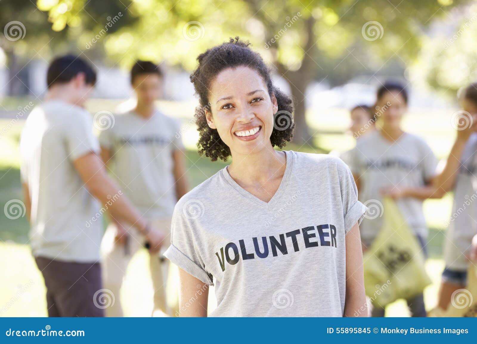 Volunteer Group Clearing Litter in Park Stock Image - Image of female ...