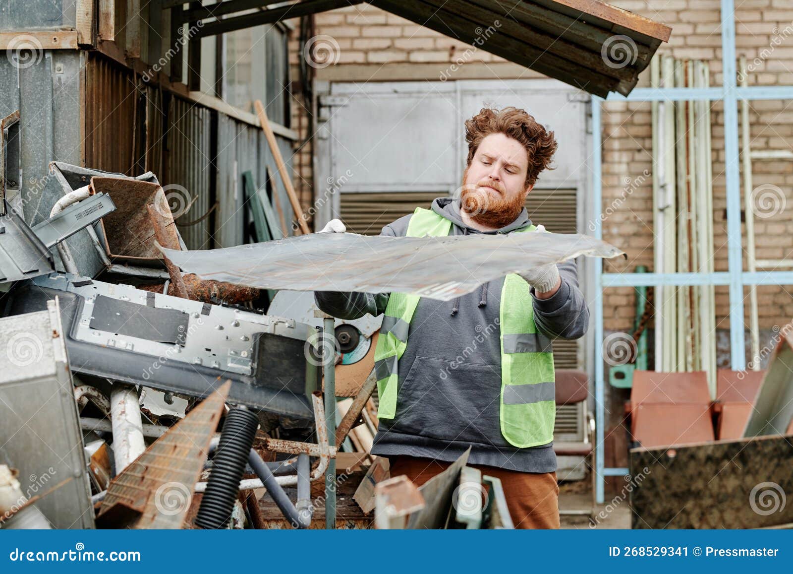 Volunteer Sorting Pieces at Scrapyard Stock Image - Image of clean ...