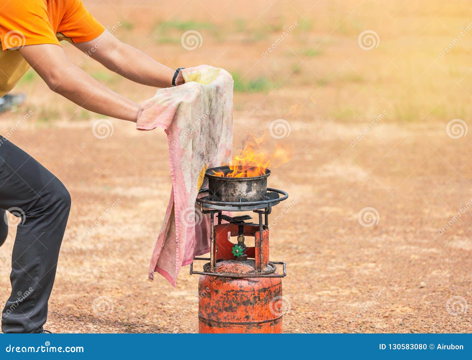 Volunteer Using Wet Cloth or Damp Cloth Beat the Flame Out during Basic ...