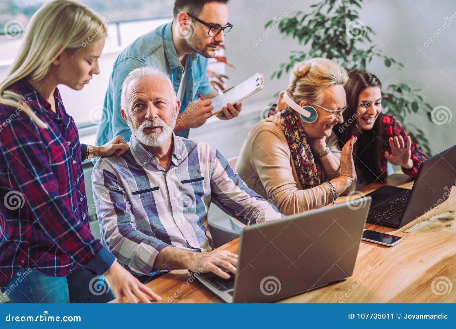 Volunteers Help Senior People on the Computer Stock Image - Image of ...