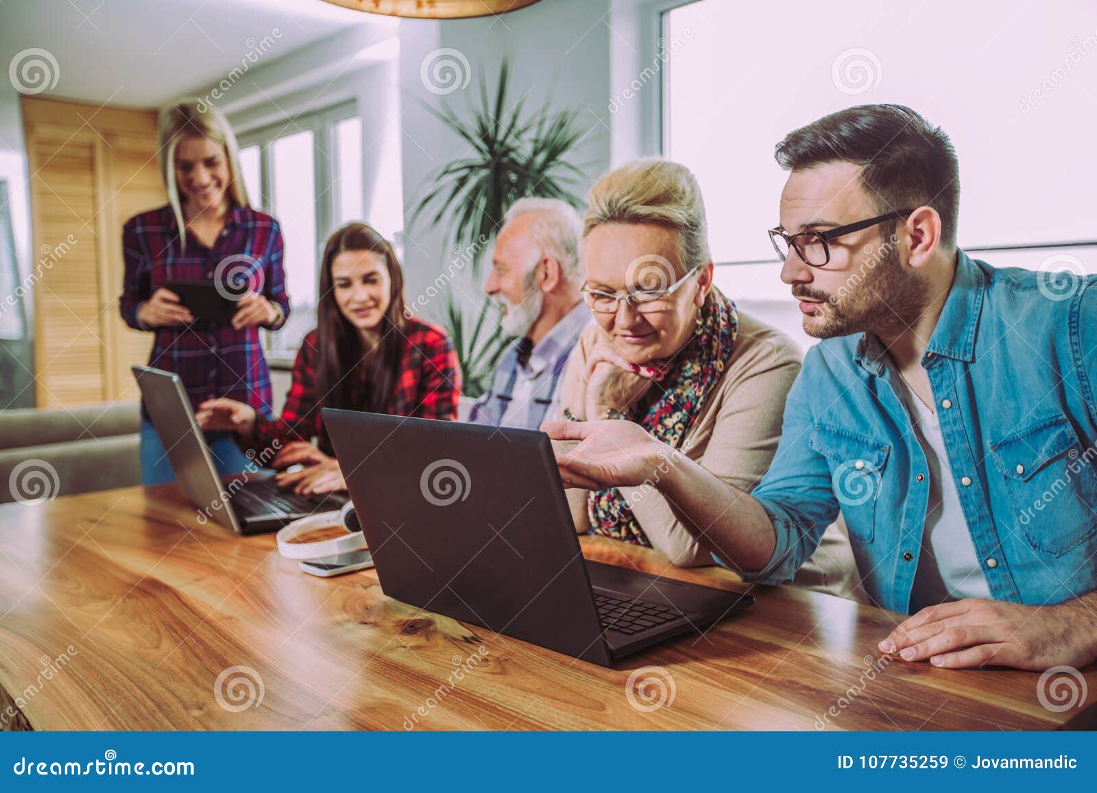 Volunteers Help Senior People on the Computer Stock Image - Image of ...
