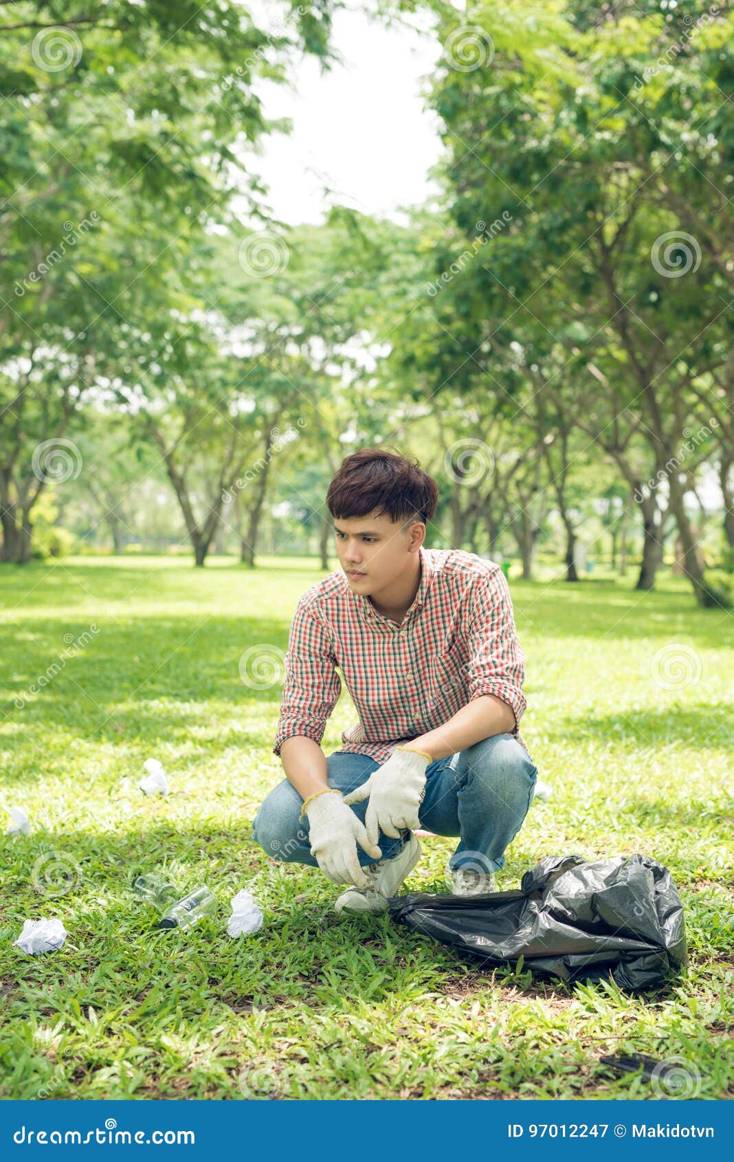 Volunteers Picking Up Litter In The Park. Father And His Toddler Son ...