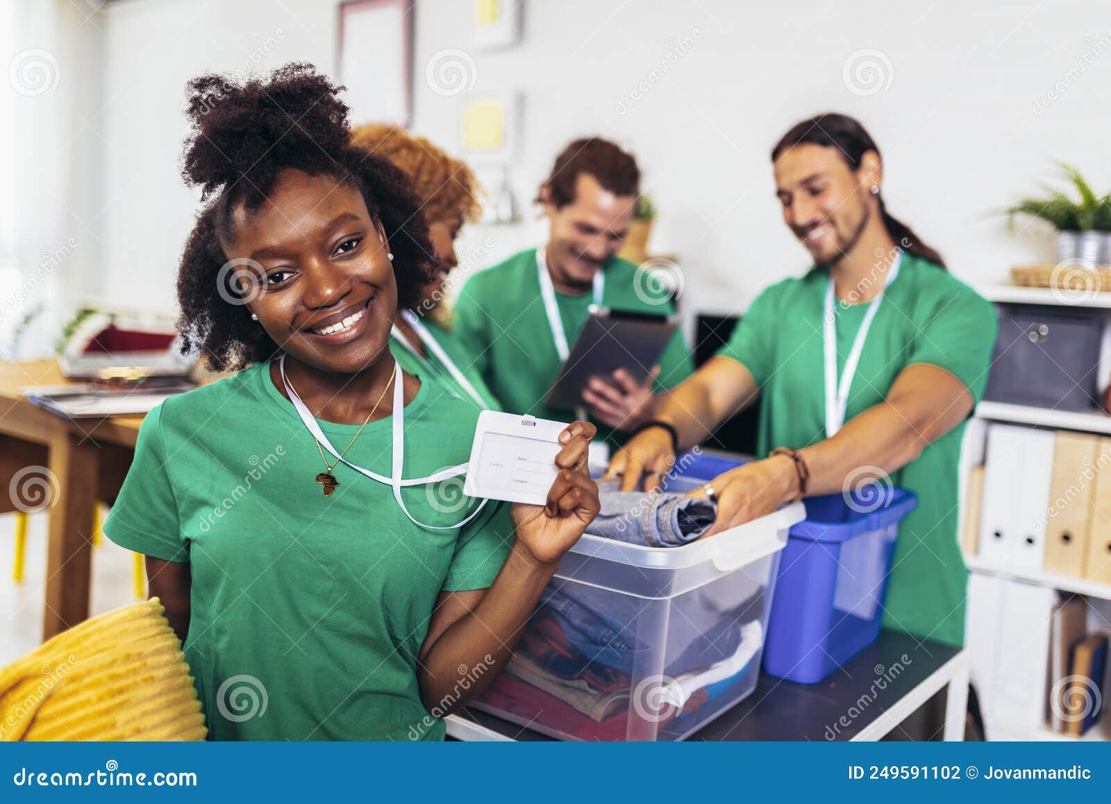 Volunteers Putting Clothes in Donation Boxes, Social Worker Making ...