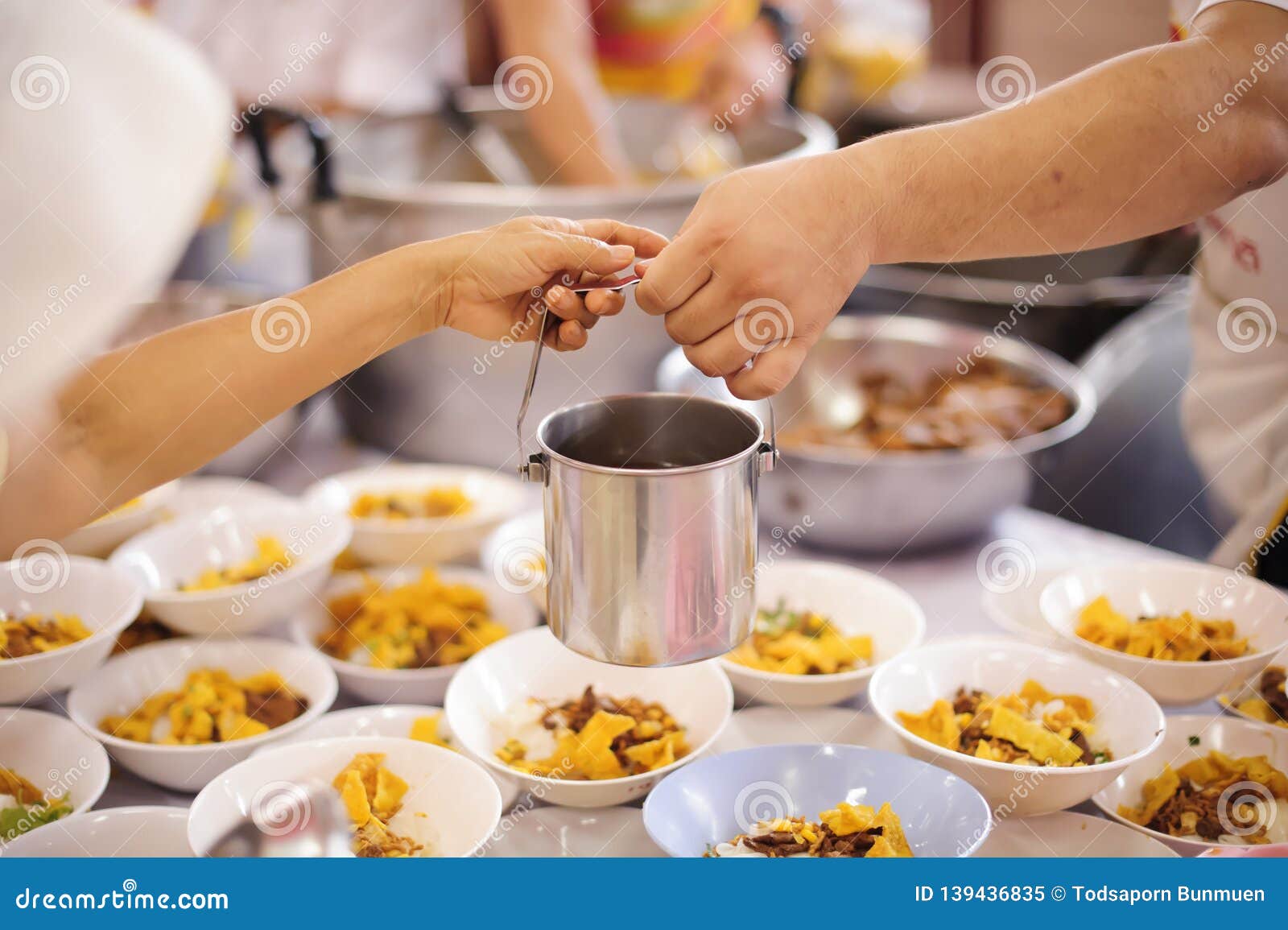 Volunteers Serving Food for Poor People : Food Sharing Concept Stock ...