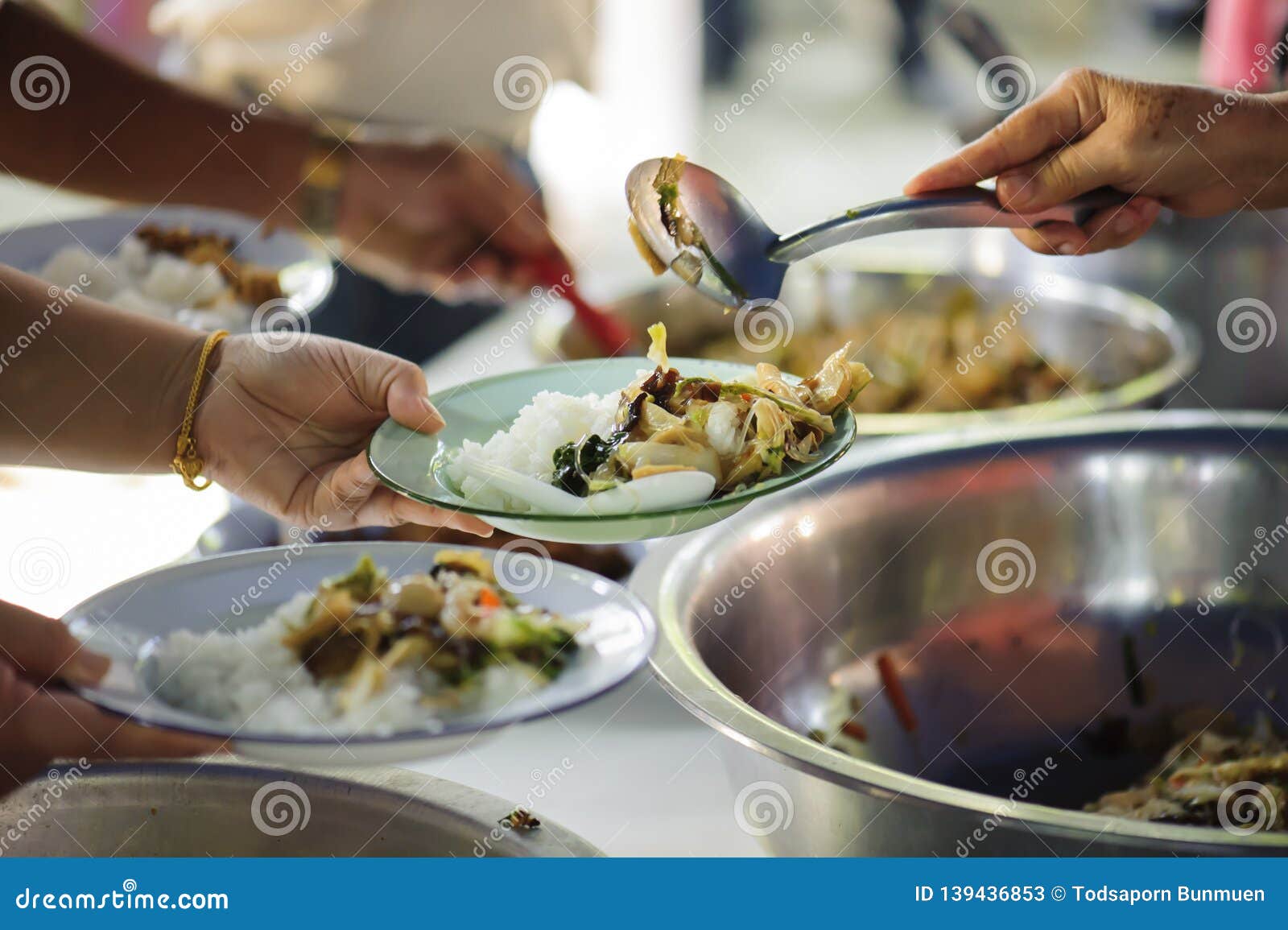 Volunteers Serving Food for Poor People : Food Sharing Concept Stock ...