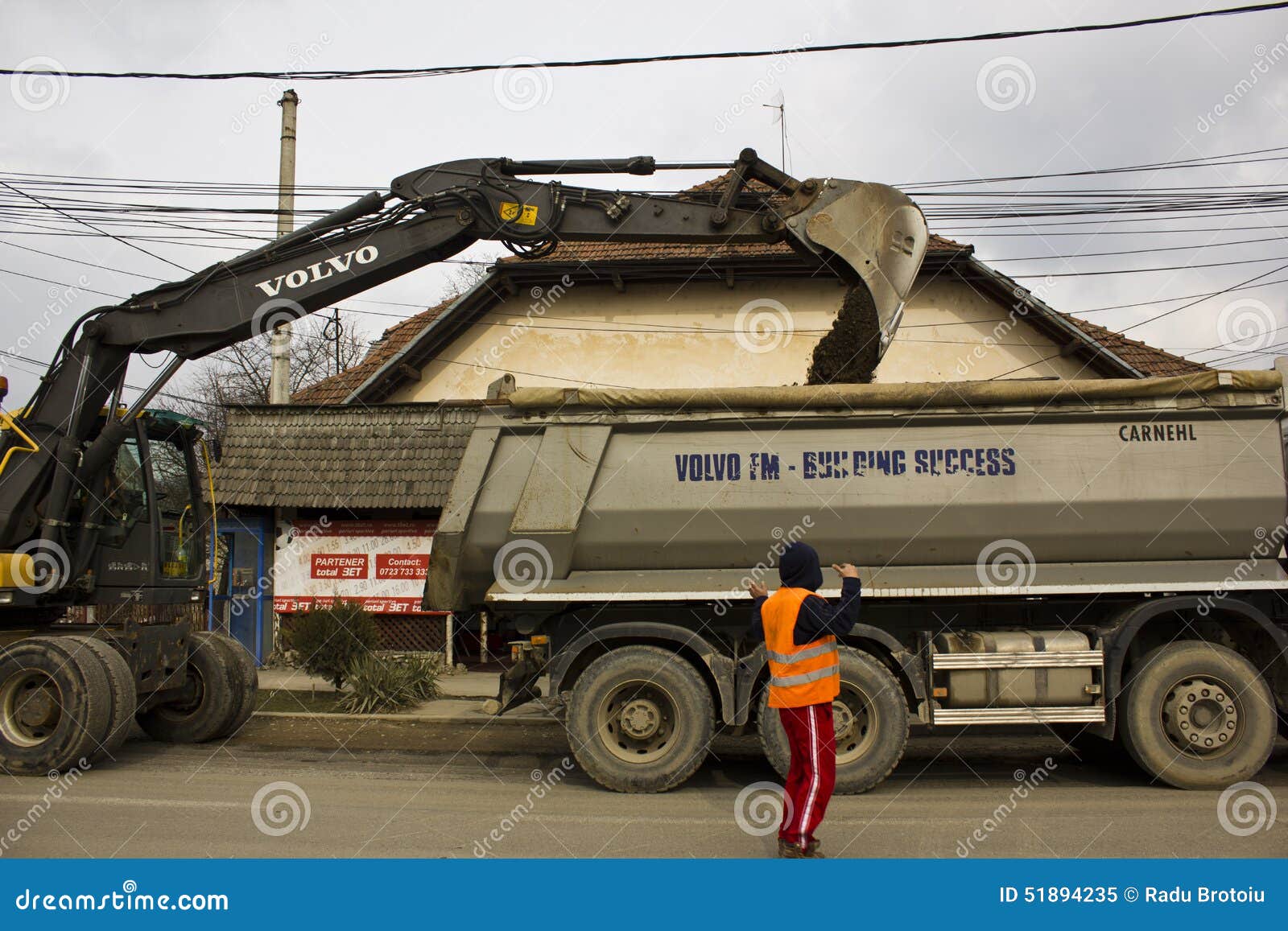 Volvo Excavator Loading the Truck Editorial Image - Image of wheeled ...