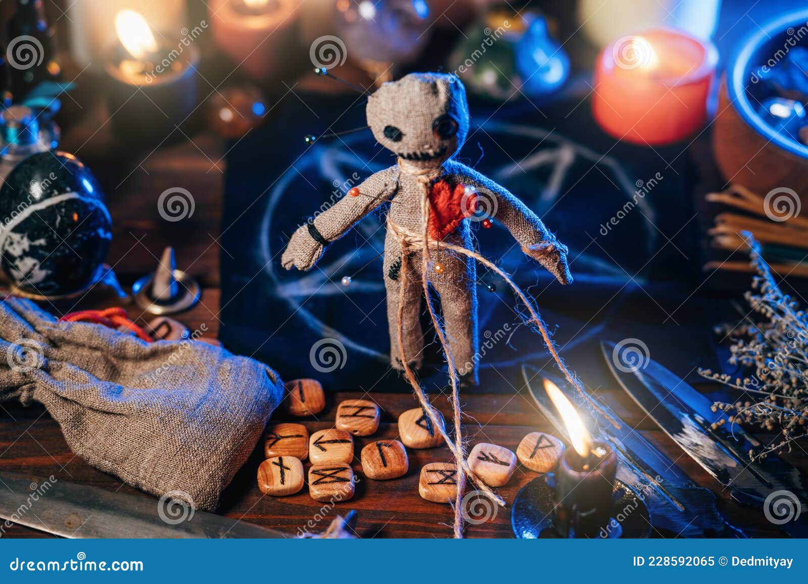 Voodoo Doll among Burning Candles and Magical Ritual Items for Dark ...