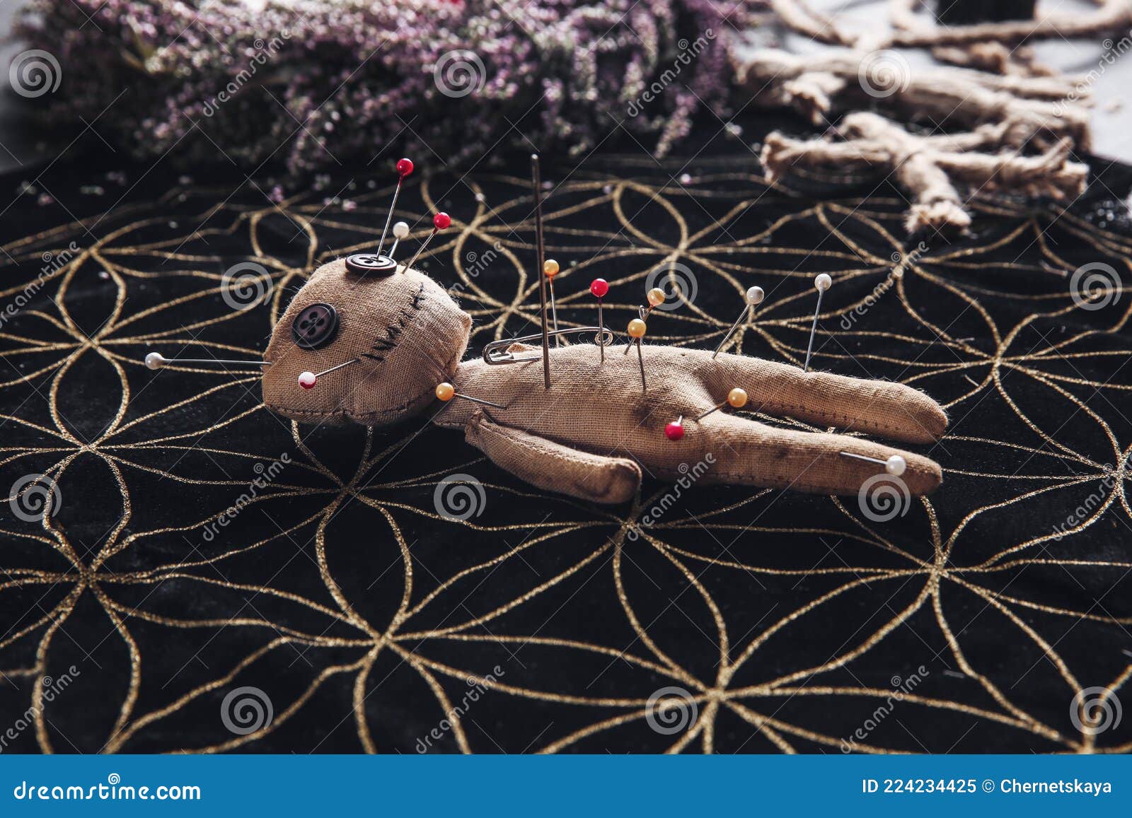 Voodoo Doll Pierced with Pins on Table. Curse Ceremony Stock Image ...