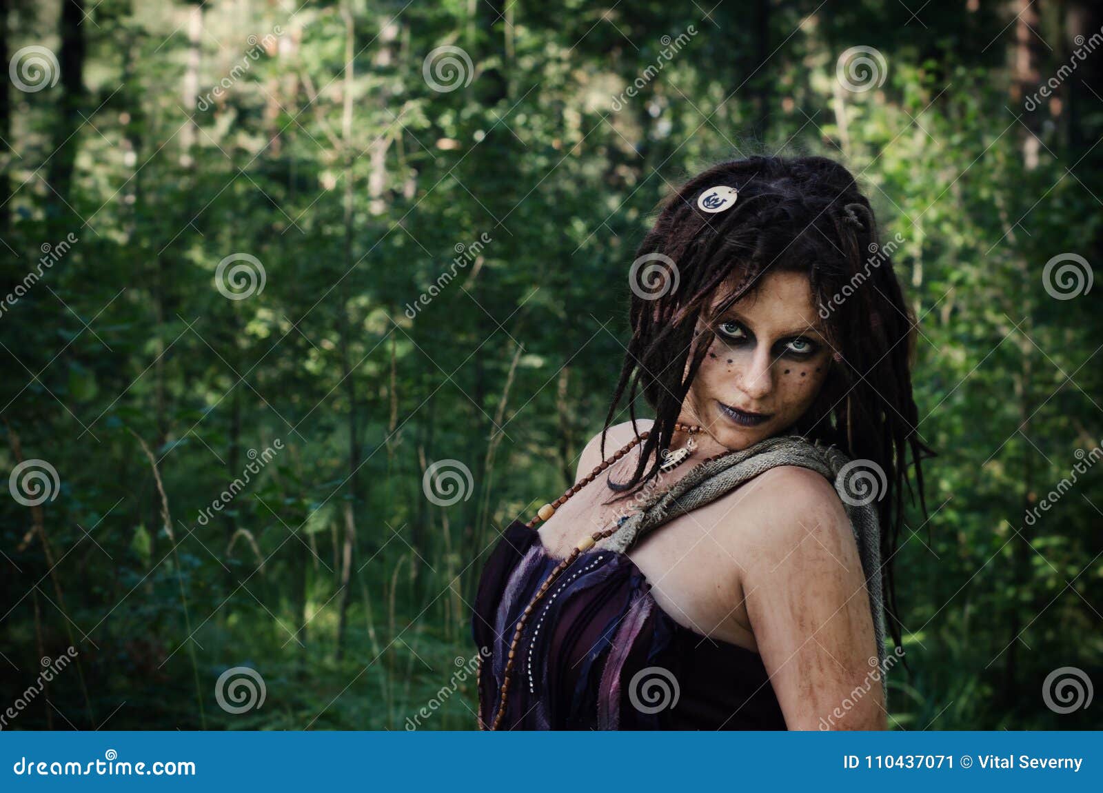 Voodoo witch in the woods. stock image. Image of dress - 110437071