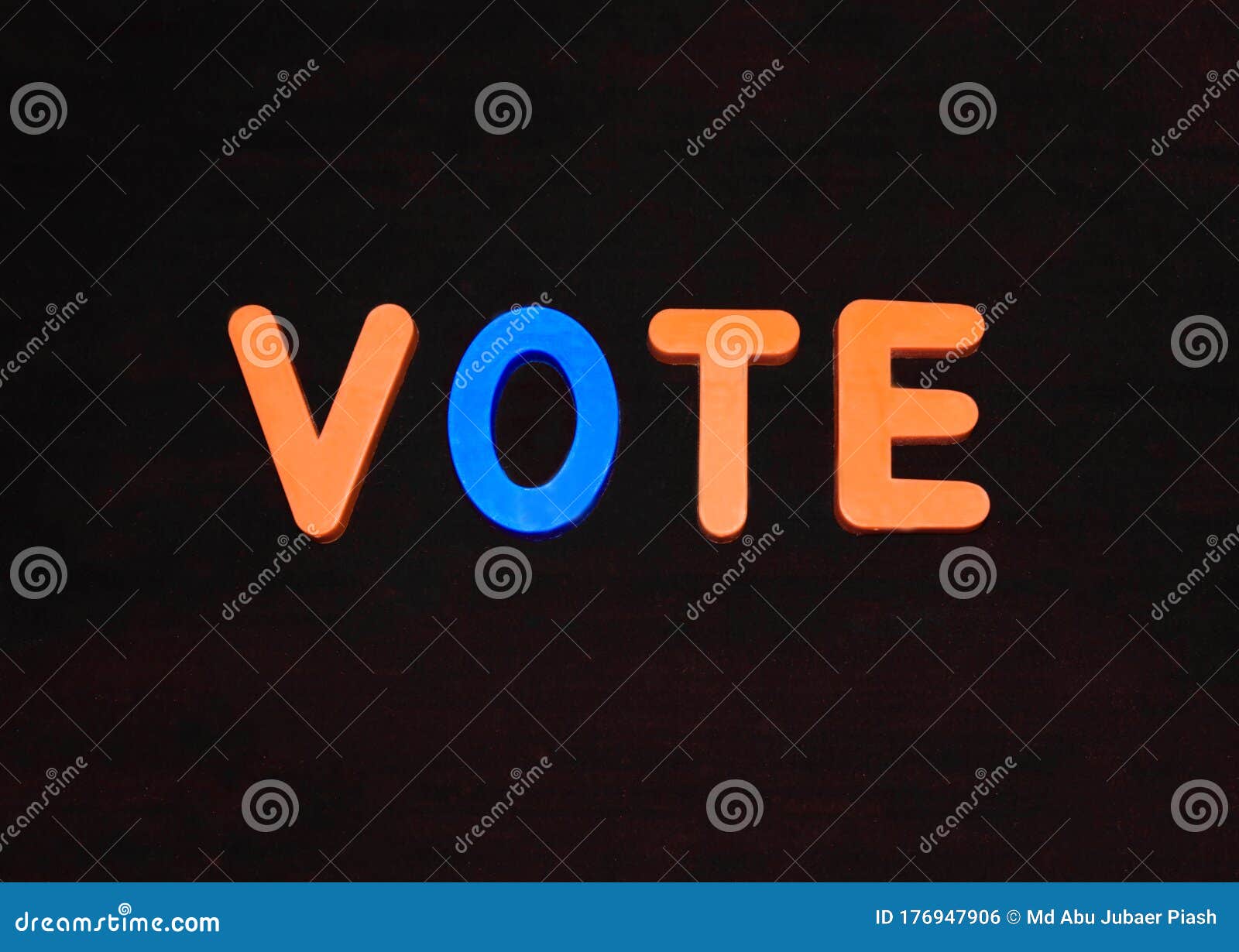 Vote Word Written with Different Colored Letter Blocks on a Dark ...