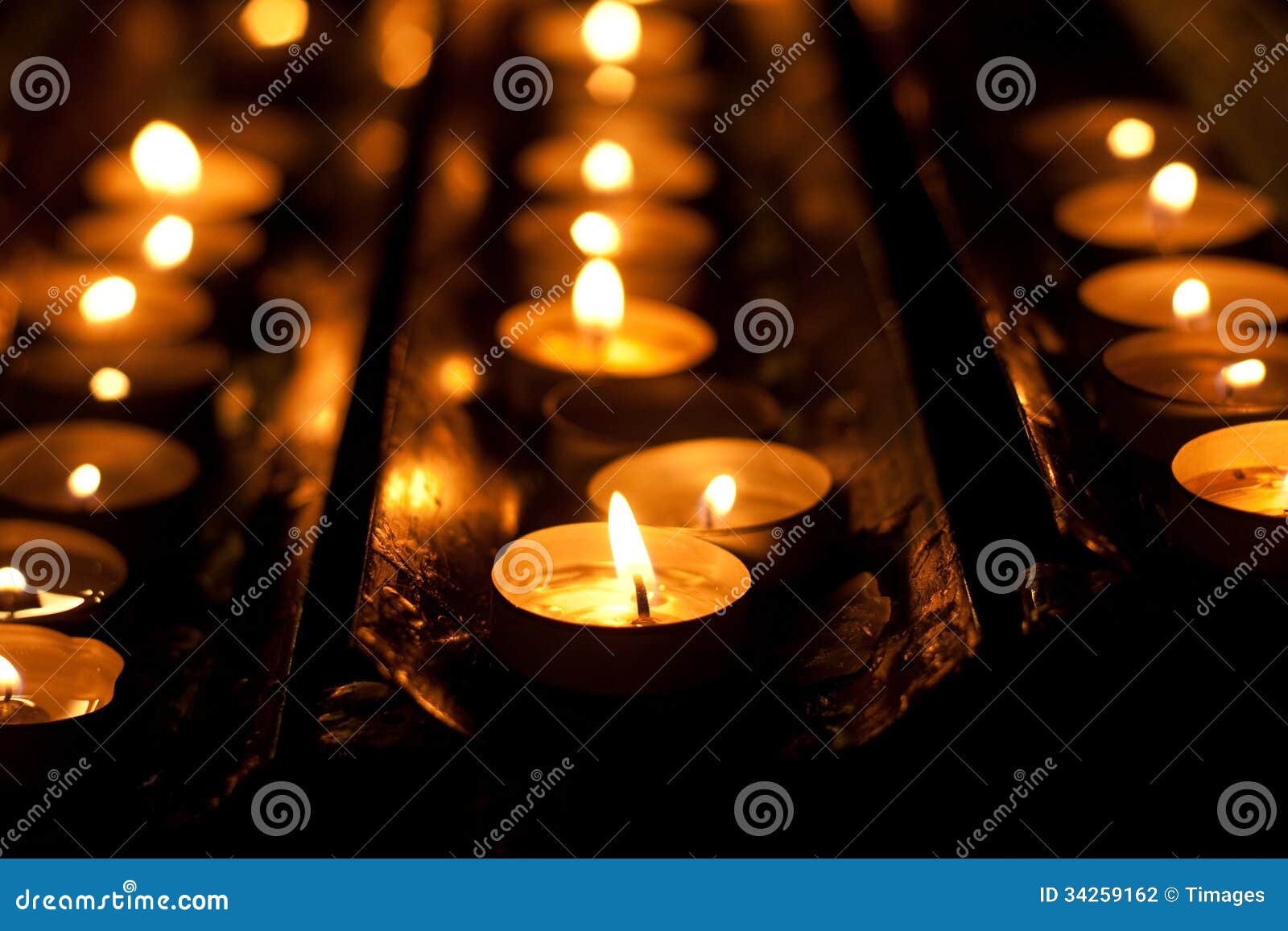 Votive candles stock photo. Image of prayer, candle, flame - 34259162