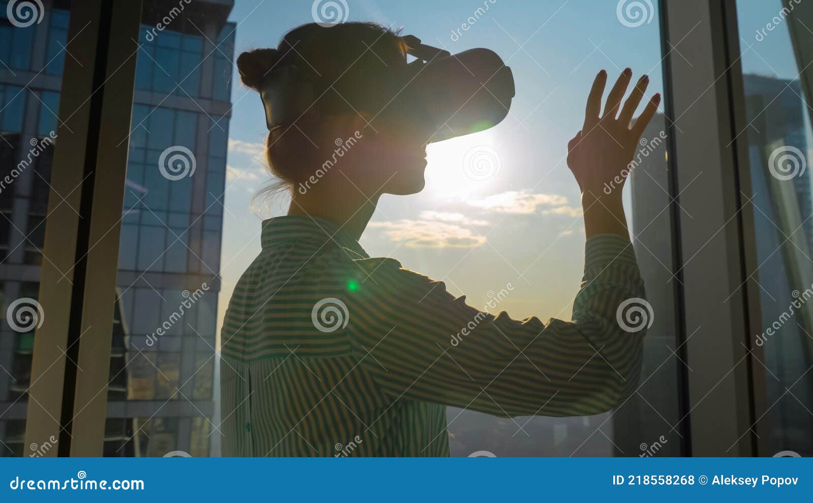 VR Concept - Young Woman Using Virtual Reality Headset Against ...
