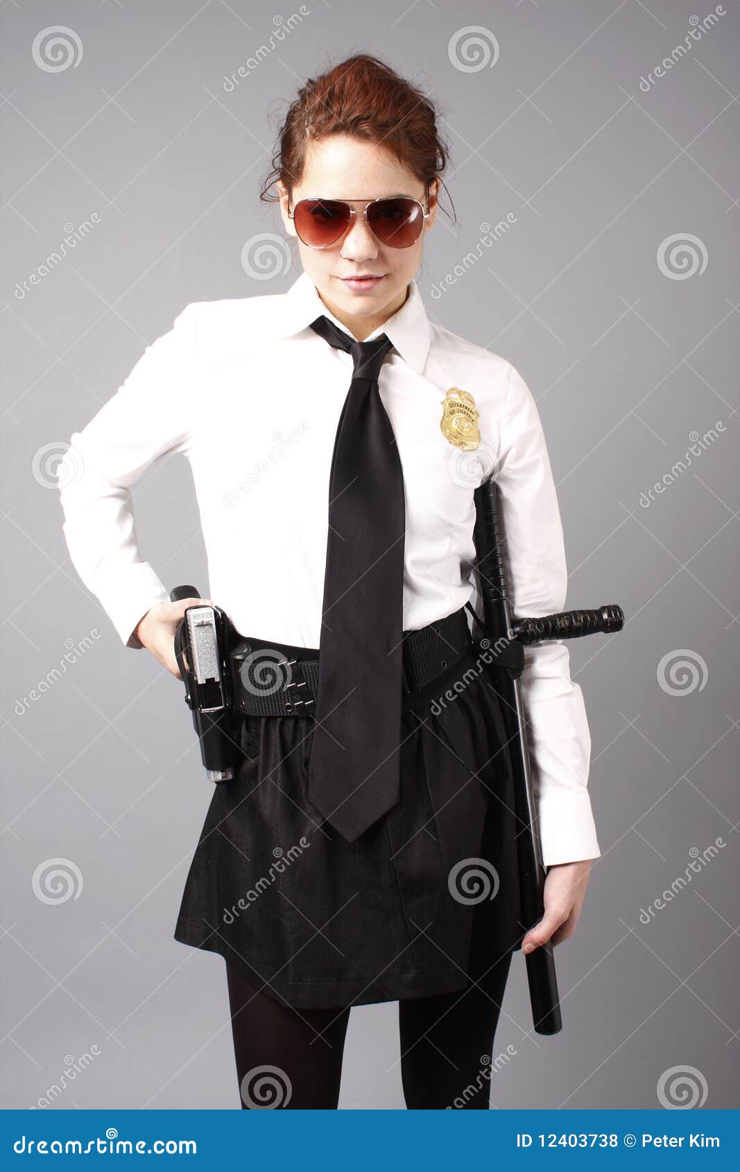 Vrouwelijke Politieman Stock Foto Image Of Kanon Meisje 12403738