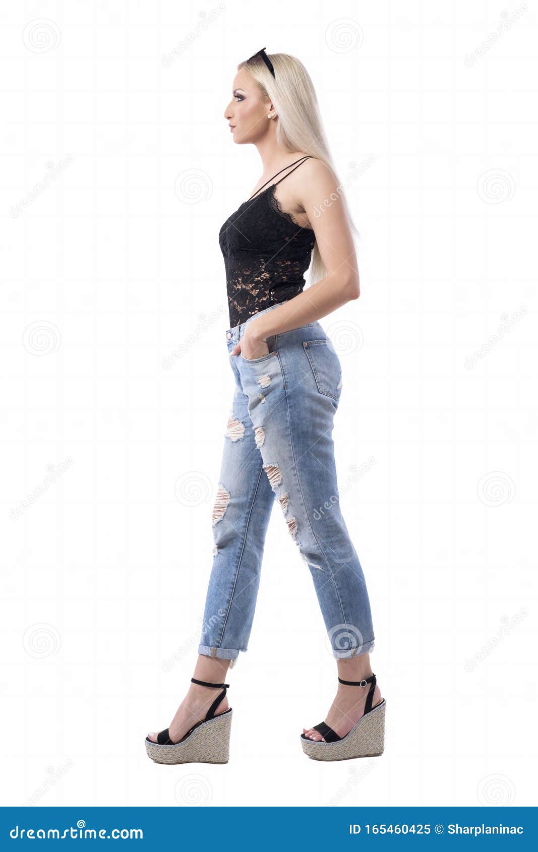 Vue Du Profil Dune Jeune Fille Blonde Branchée Et Branchée En Jeans