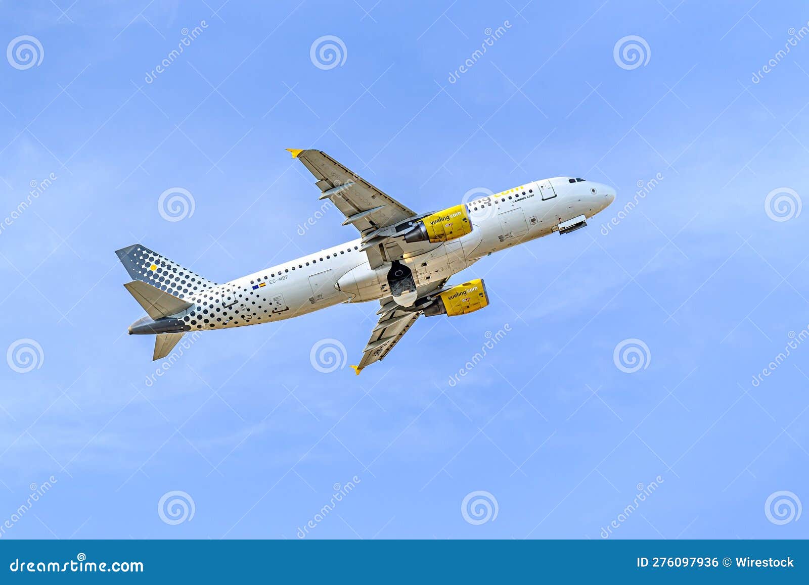Vueling Airbus A320 Passenger Airplane Soaring through the Bright Blue ...