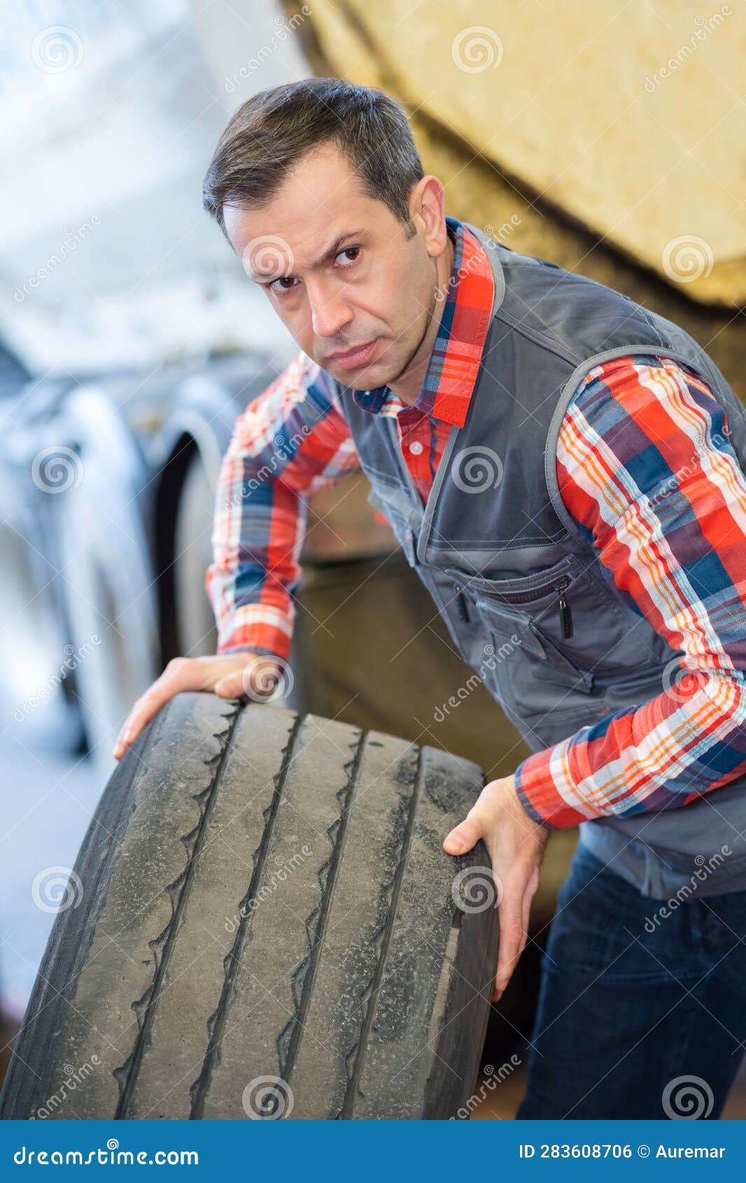 Vulcanizing Worker Rolling Rural Tire Stock Photo - Image of tractor ...