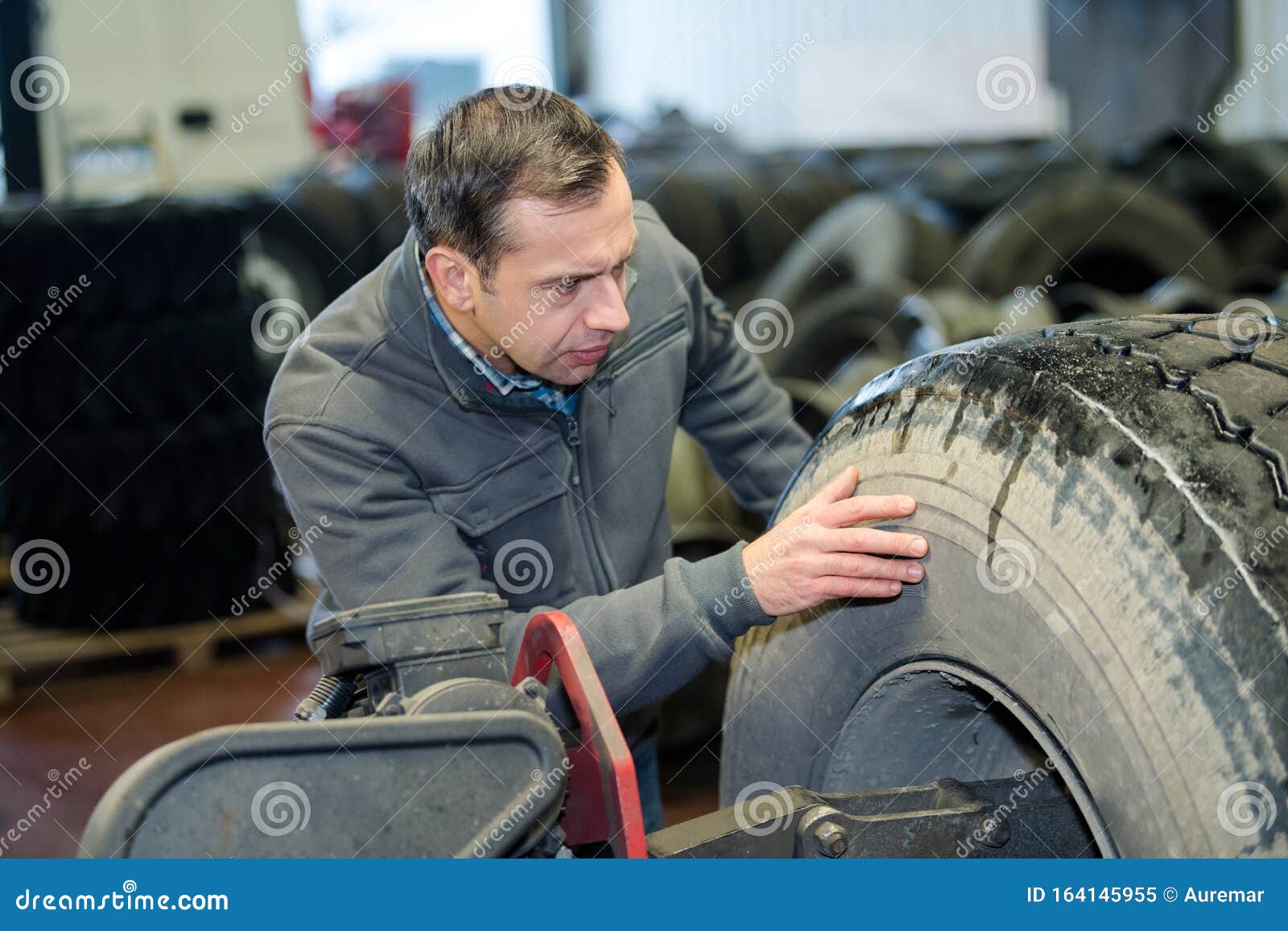 Vulcanizing Worker Searching for Puncture Stock Image - Image of ...