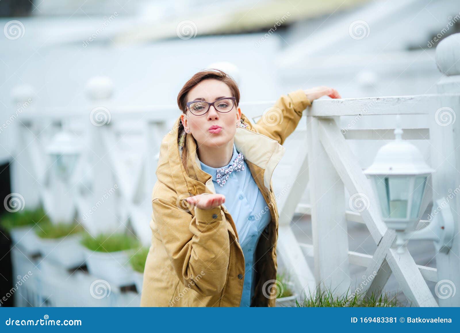 Vumen Outdoors in a Raincoat and Glasses on the Streets Stock Image ...