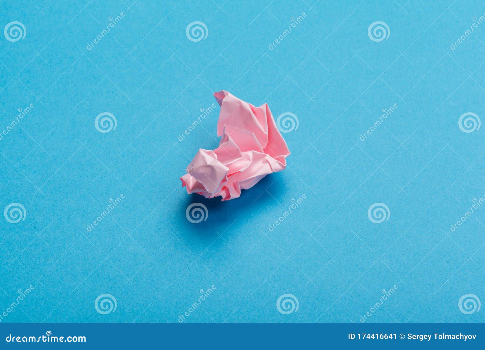 Wadded Paper Balls on a Blue Background Stock Image - Image of message ...