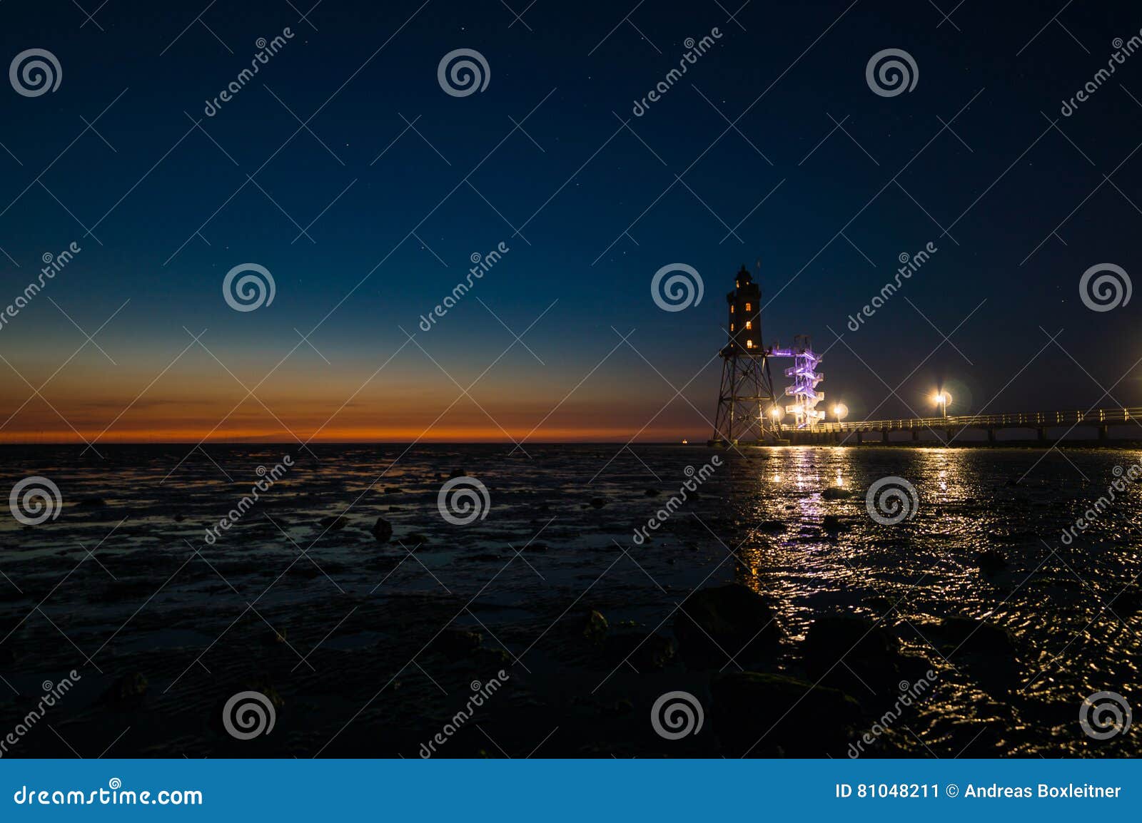 Wadden Sea at Night with Lighthouse Stock Image - Image of wadden, sand ...