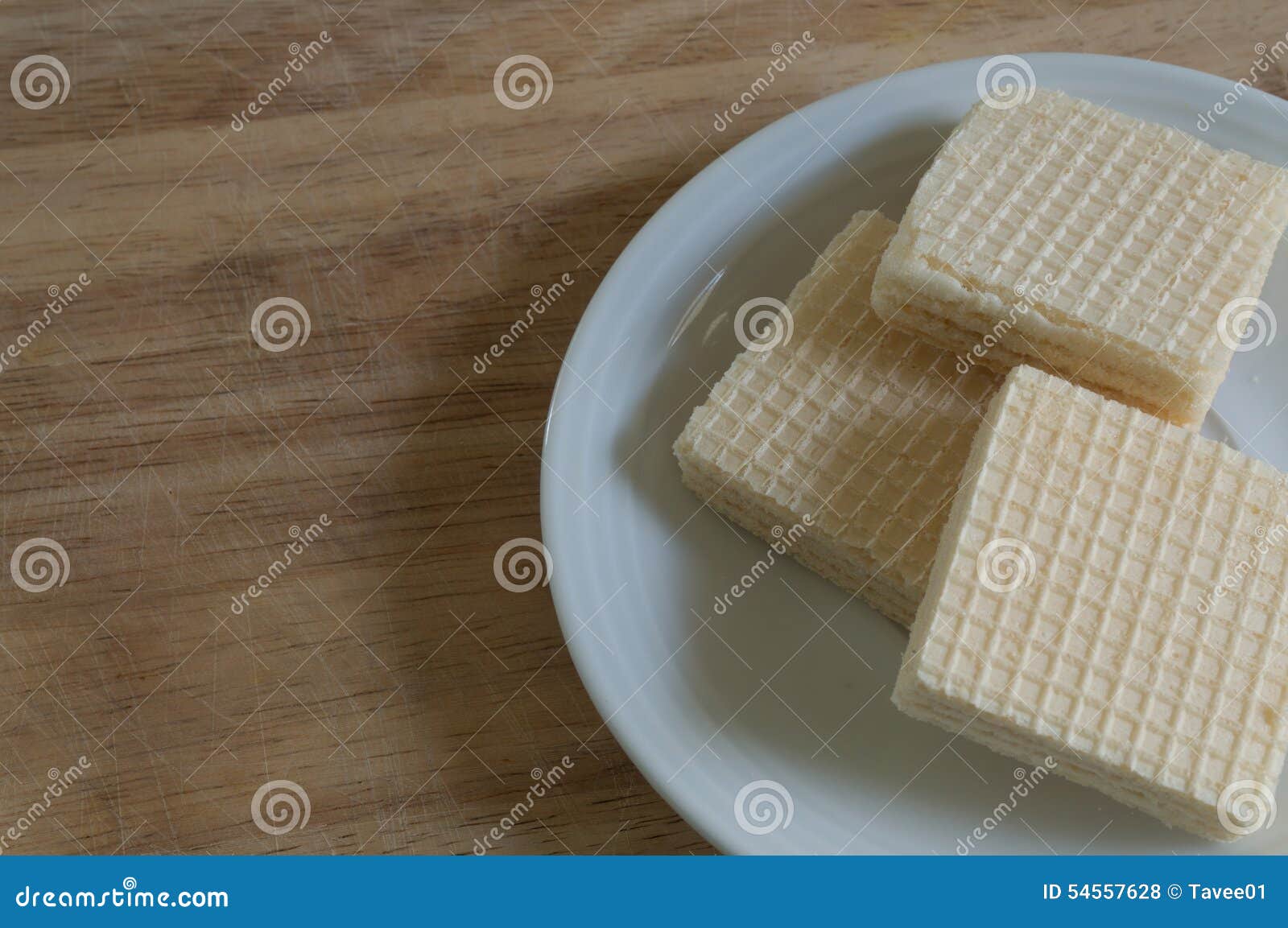 Wafer and plate on table stock photo. Image of tasty - 54557628