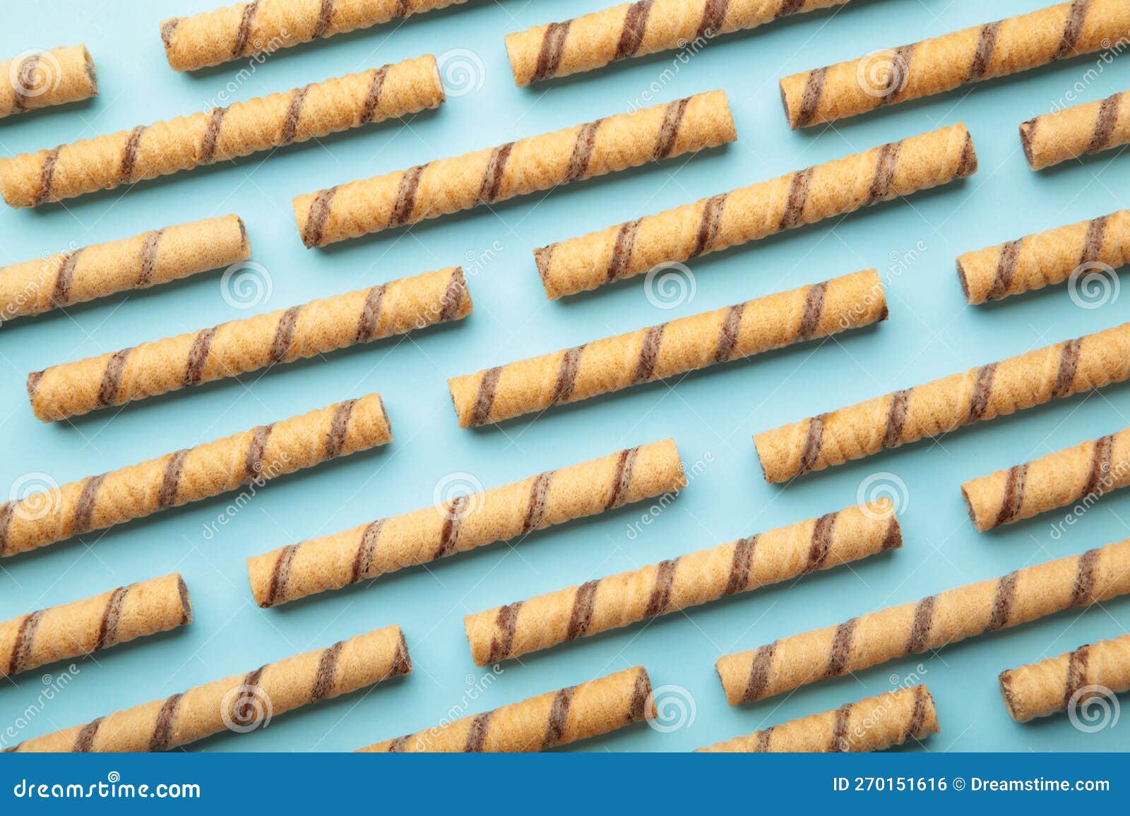 Wafer Roll Sticks Cream Rolls on Blue Background. Minimalism Stock ...