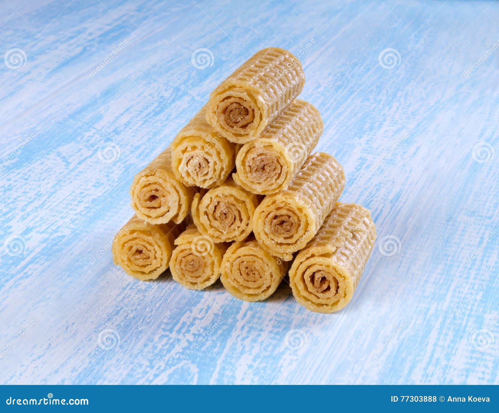 Wafer Rolls on a Wooden Blue Background. Wafer Rolls are Folded Stock ...