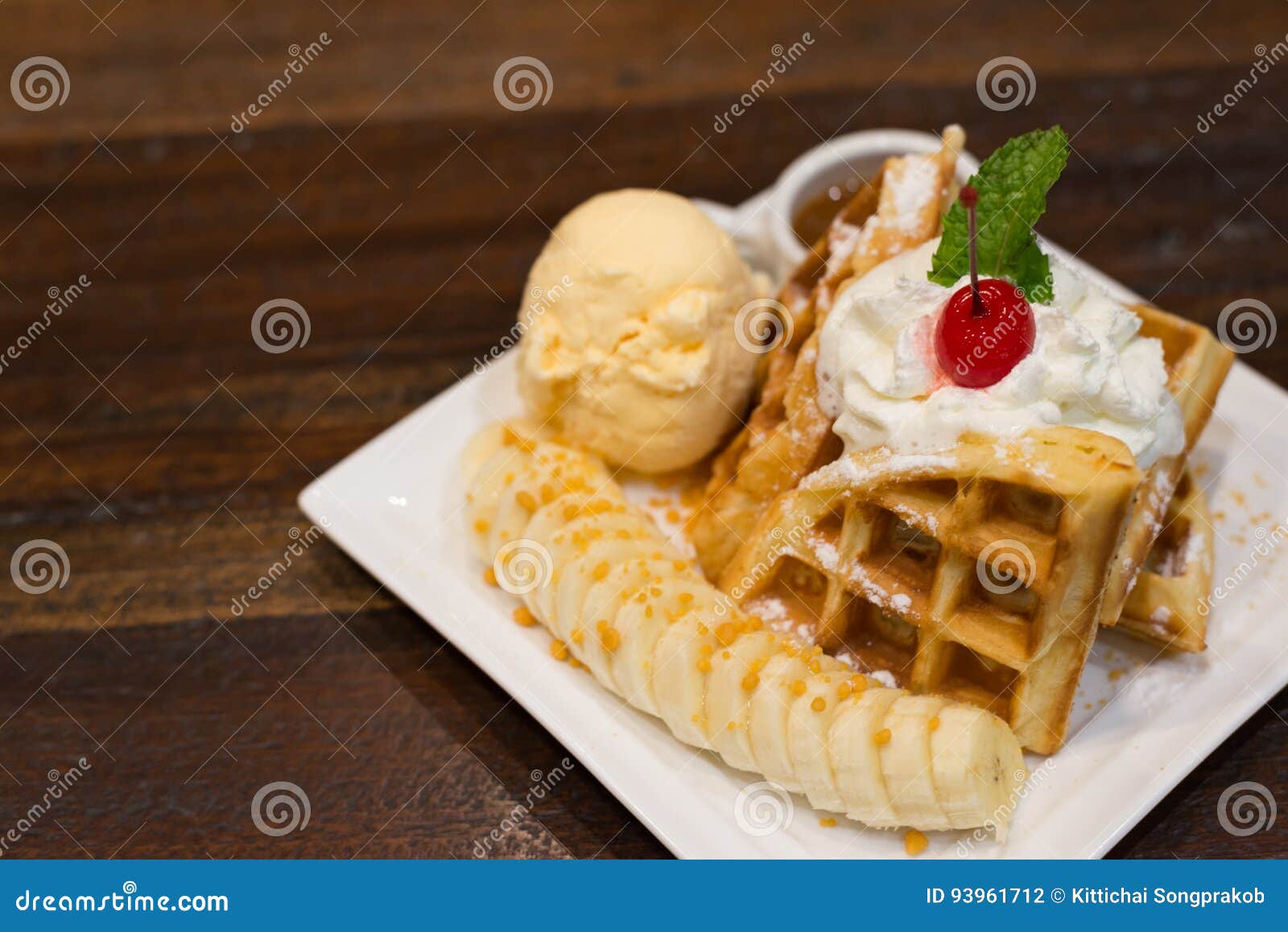 Waffle Topped with Ice Cream , Banana and Wipe Cream Stock Photo ...
