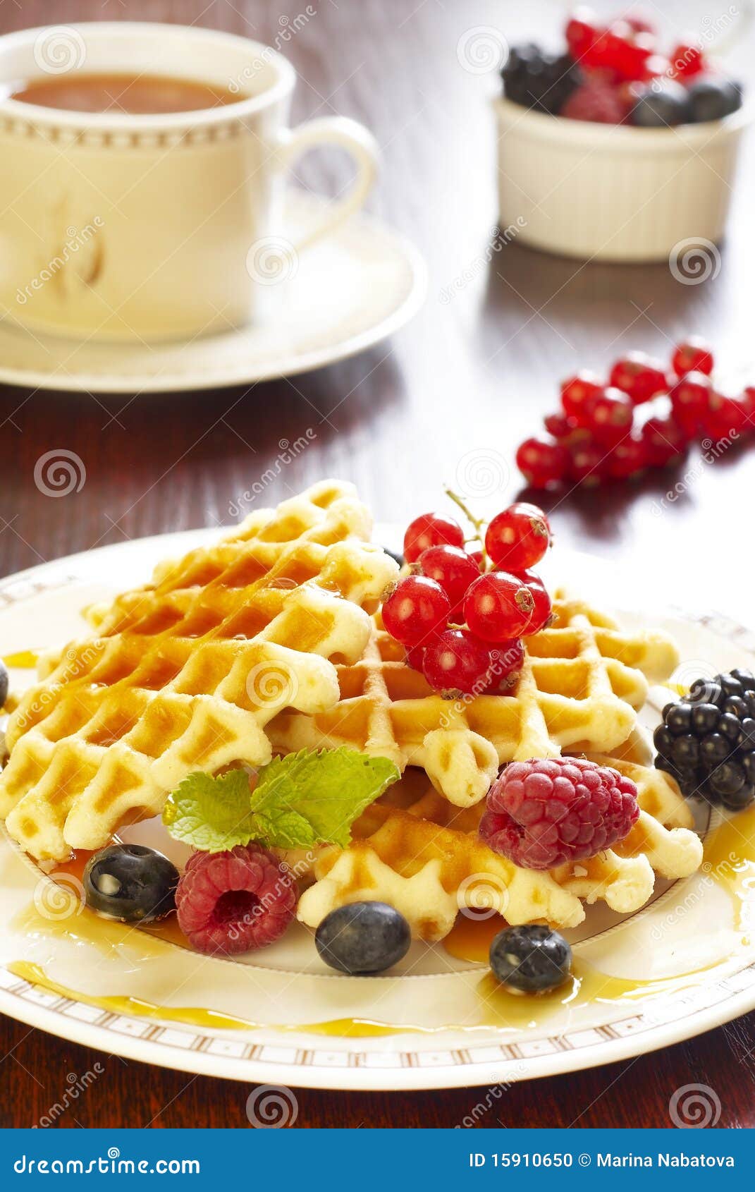 Waffles with Honey and Berries Stock Photo - Image of plate, golden ...