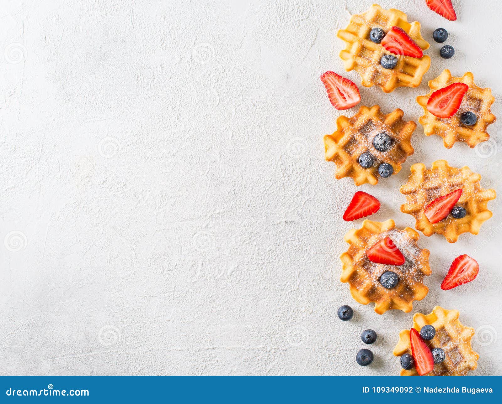 Waffles with Stawberries and Blueberries Border on Grey Background ...
