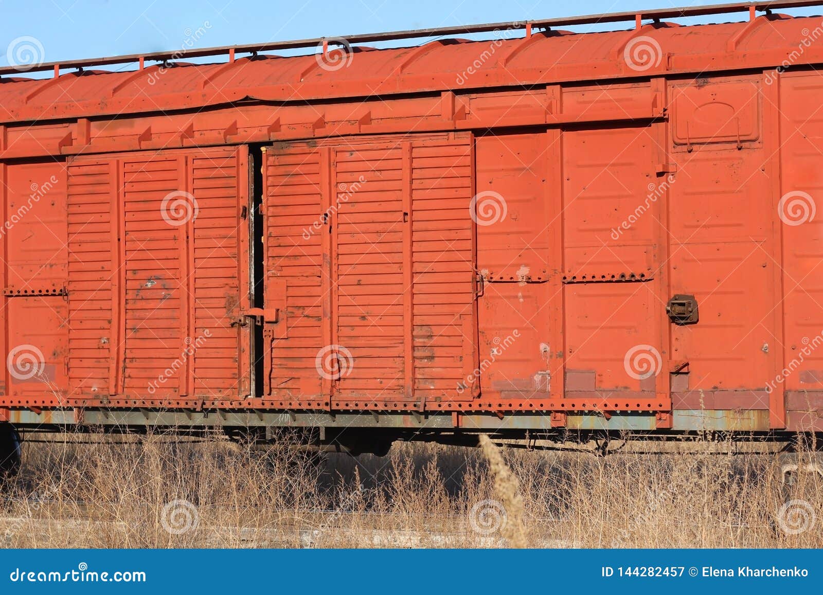 Wagon Of An Old Rusty Freight Train Stands On The Rails Stock Image ...