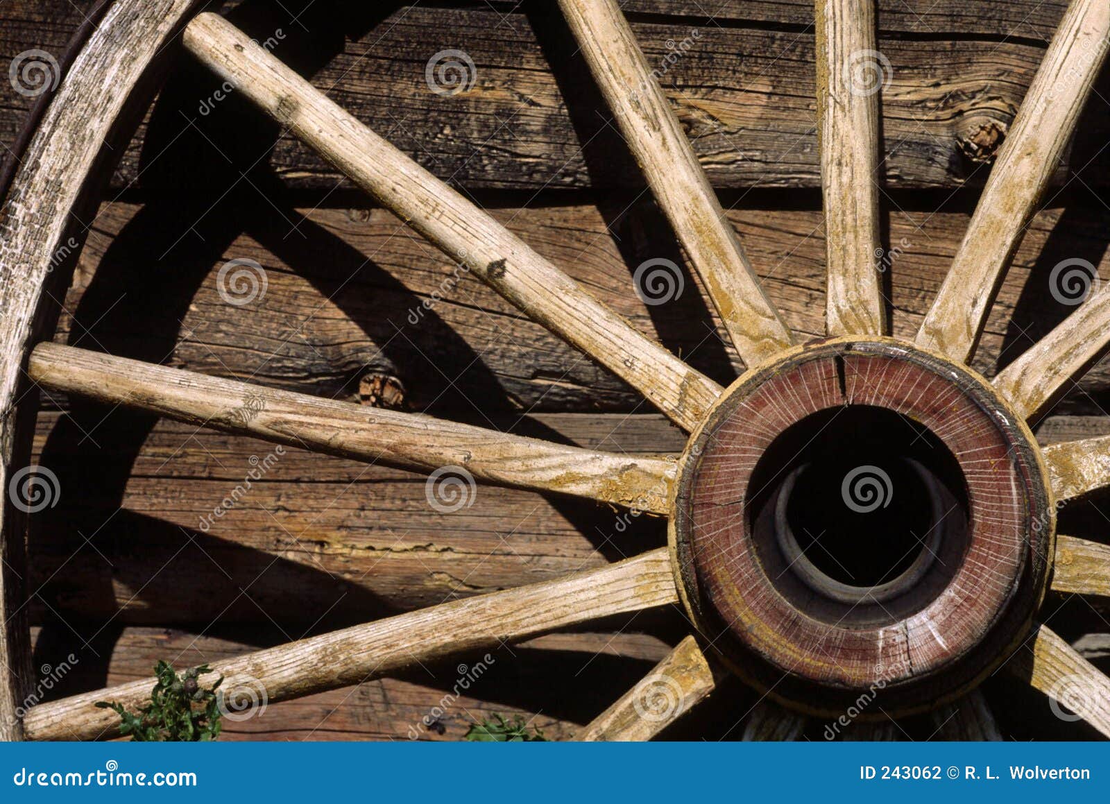 Wagon Wheel Rims Leaning On A Rustic Building Royalty-Free Stock Photo ...