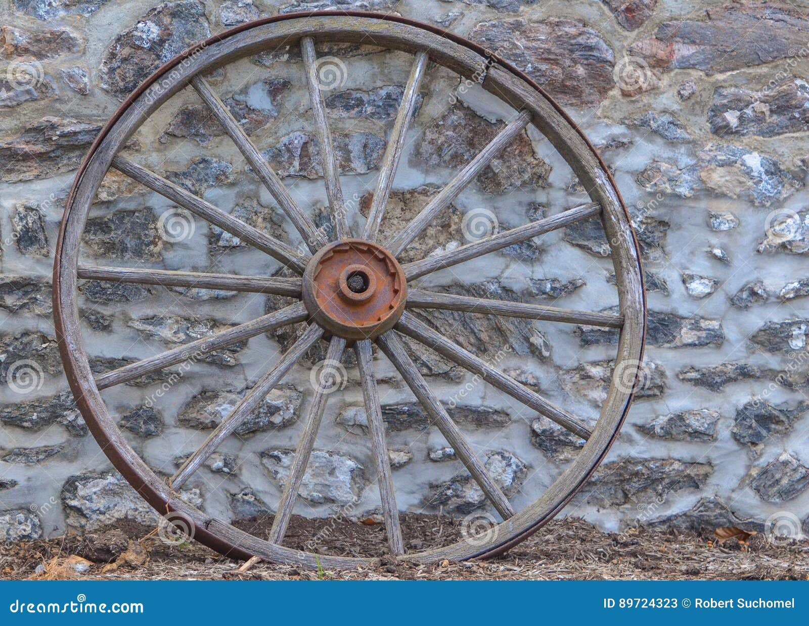 Wagon wheel stock image. Image of wooden, leaning, rural - 89724323