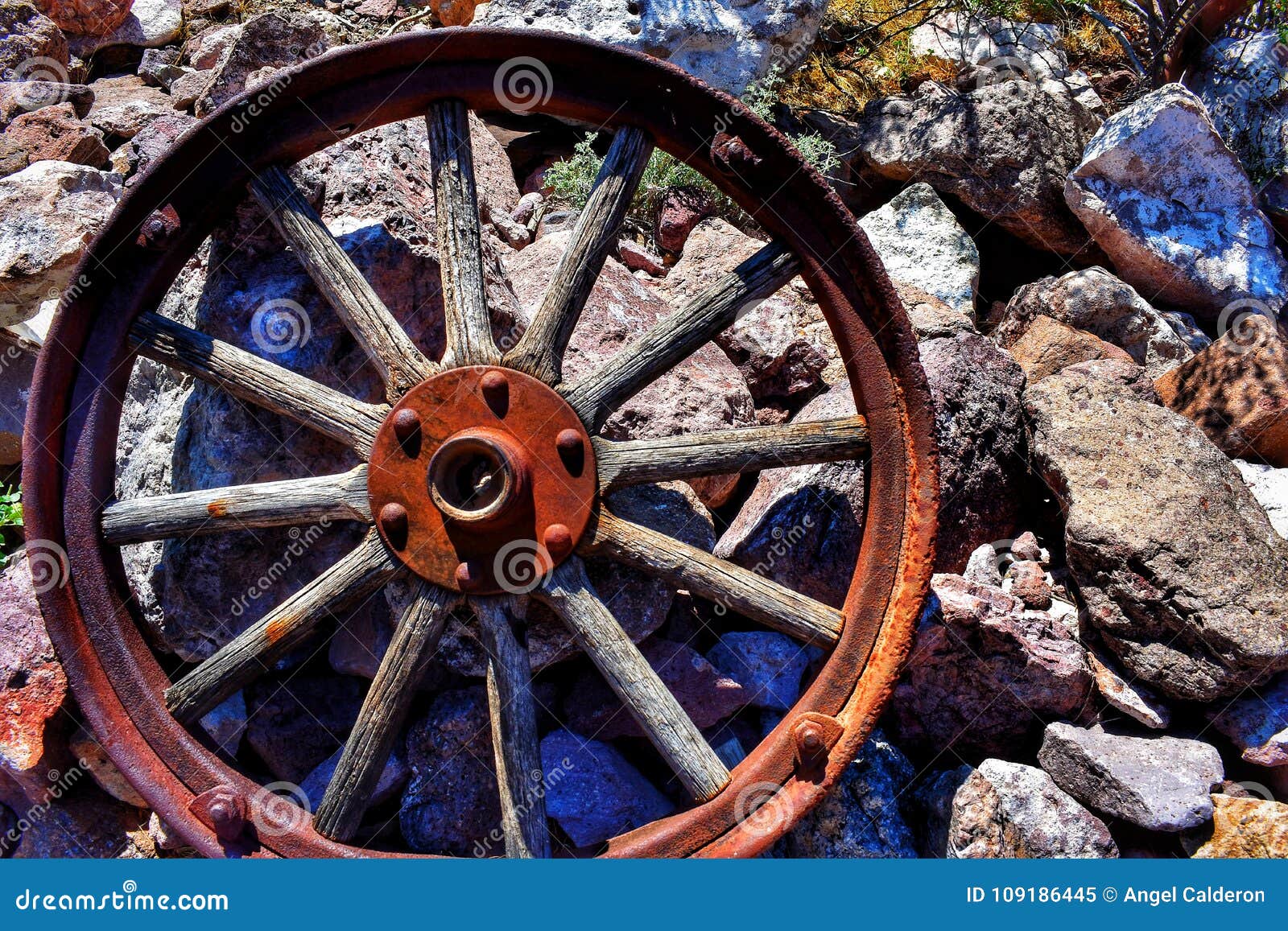 Wagon Wheel on the rocks stock image. Image of rocks - 109186445