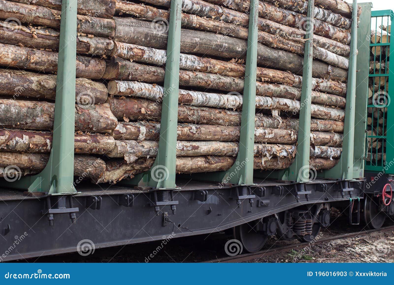 Wagons Loaded with Tree Trunks. Transport Logging and Forestry Industry ...