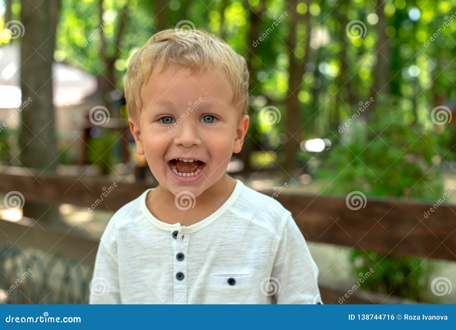 Waist Up Portrait of Cute Little Smiling Boy in Park Stock Photo ... Waist Up Portrait of Cute Little Smiling Boy in Park Stock Photo ...