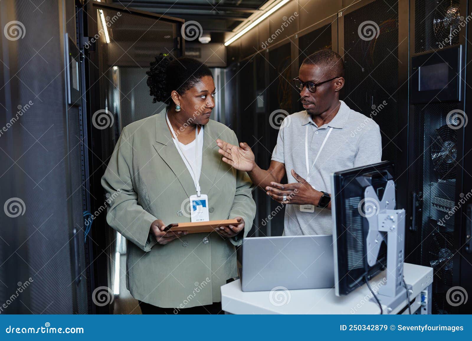 Network Engineers in Server Room Stock Image - Image of talking ...