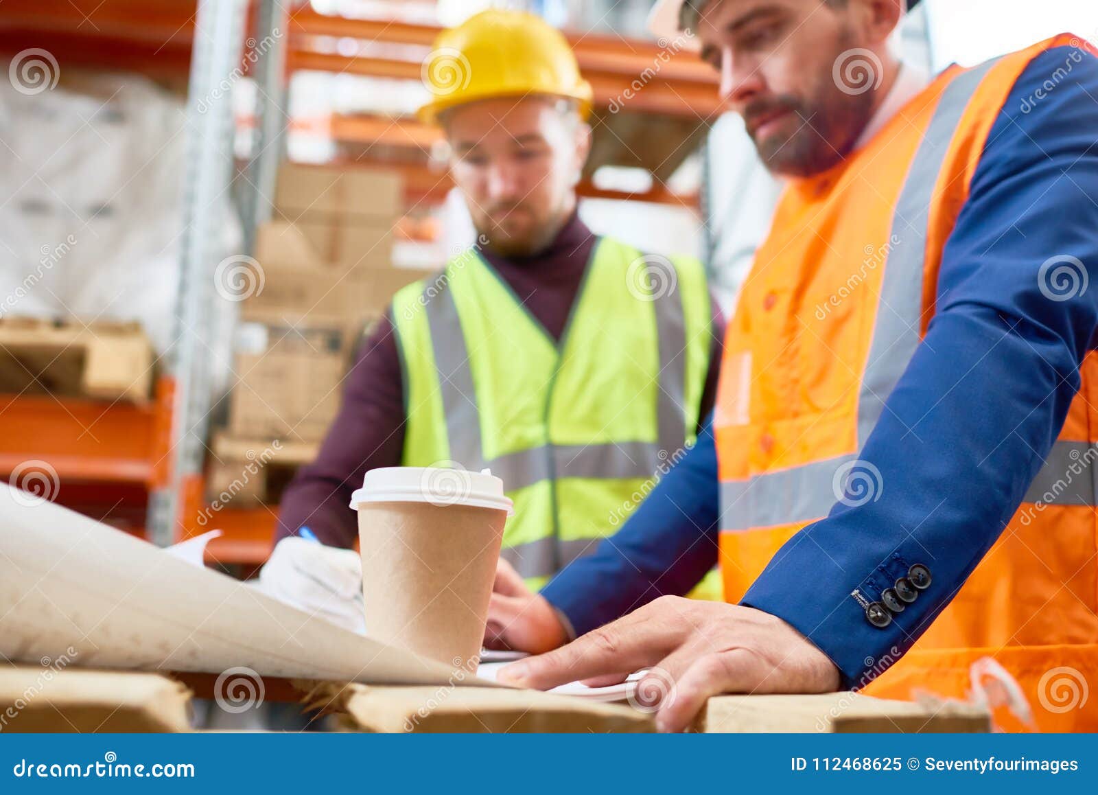 Workers Discussing Documentation Stock Image - Image of people ...