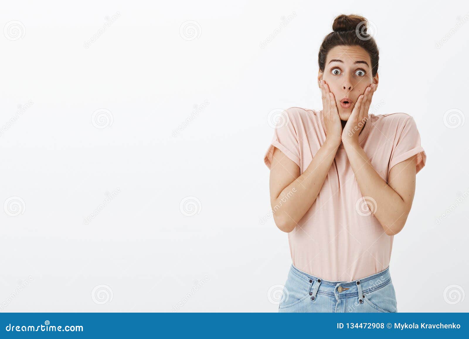 Waist Up Shot Of Excited And Surprised Young Impressed Gorgeous Woman
