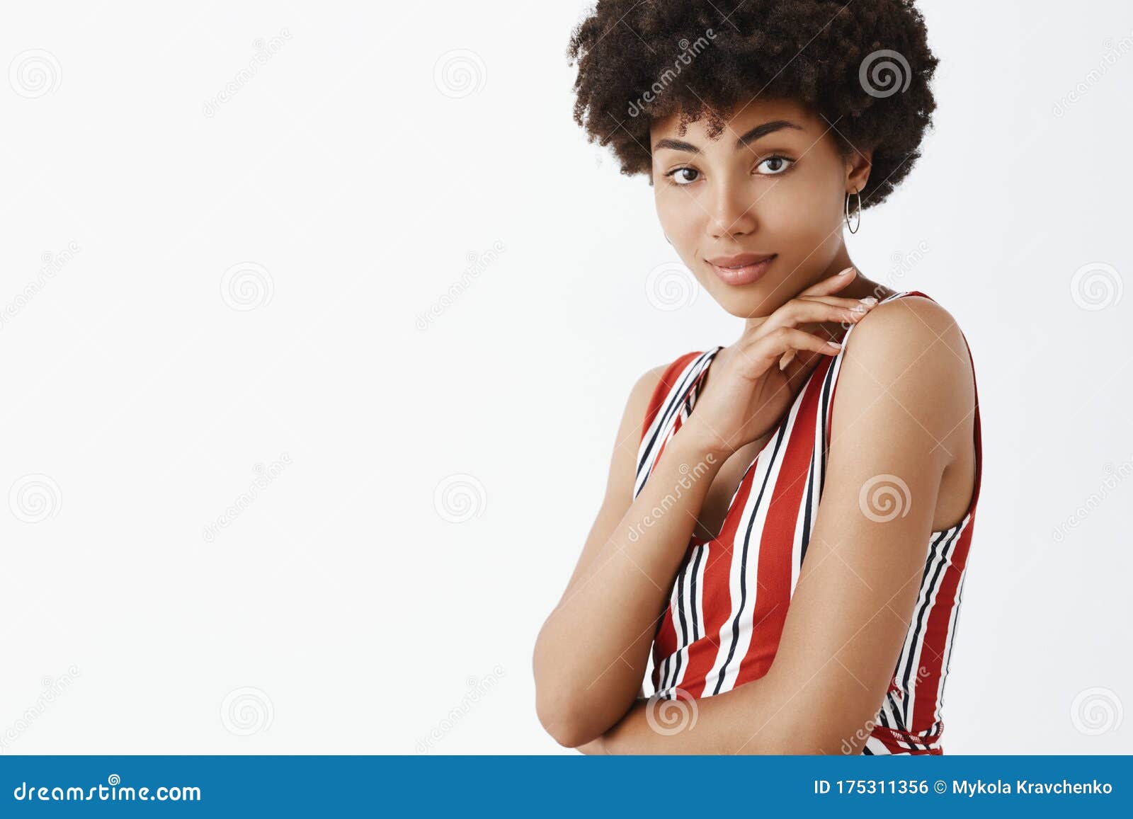 Waist Up Shot Of Good Looking Flirty And Feminine Dark Skinned Woman