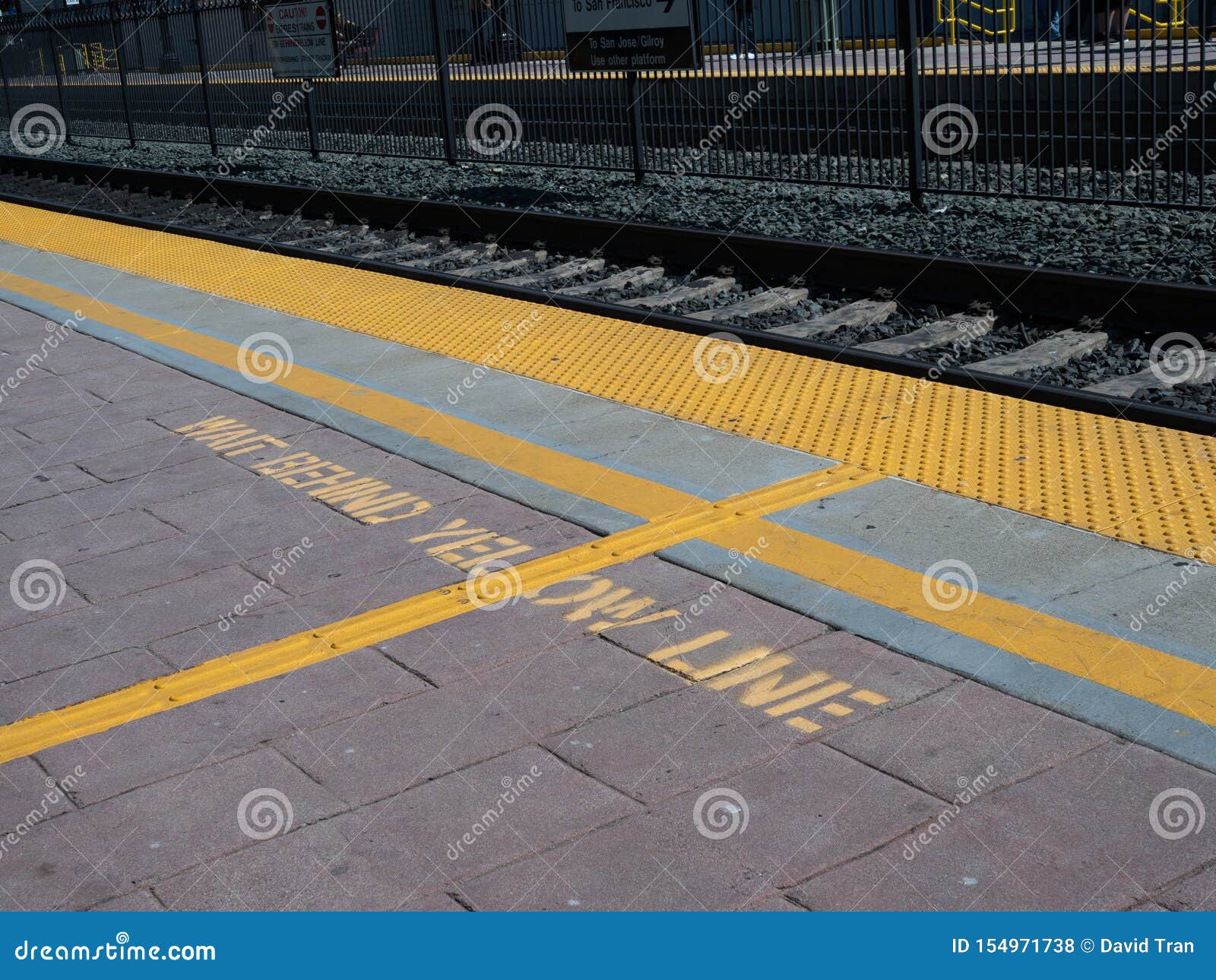 Wait Behind Yellow Line Warning on Ground on Train Platform Stock Photo ...