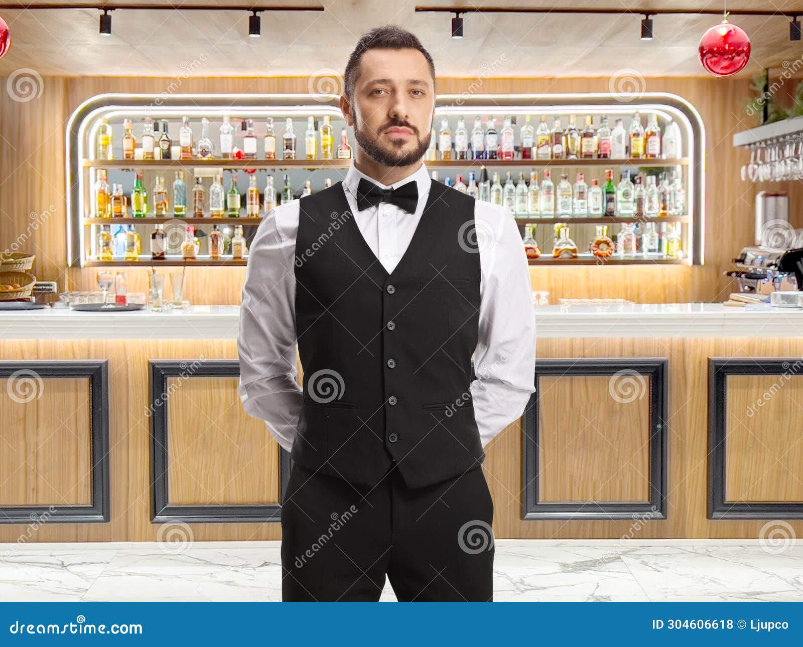 Waiter with a Bow Tie and Vest in Front of a Bar Stock Illustration ...