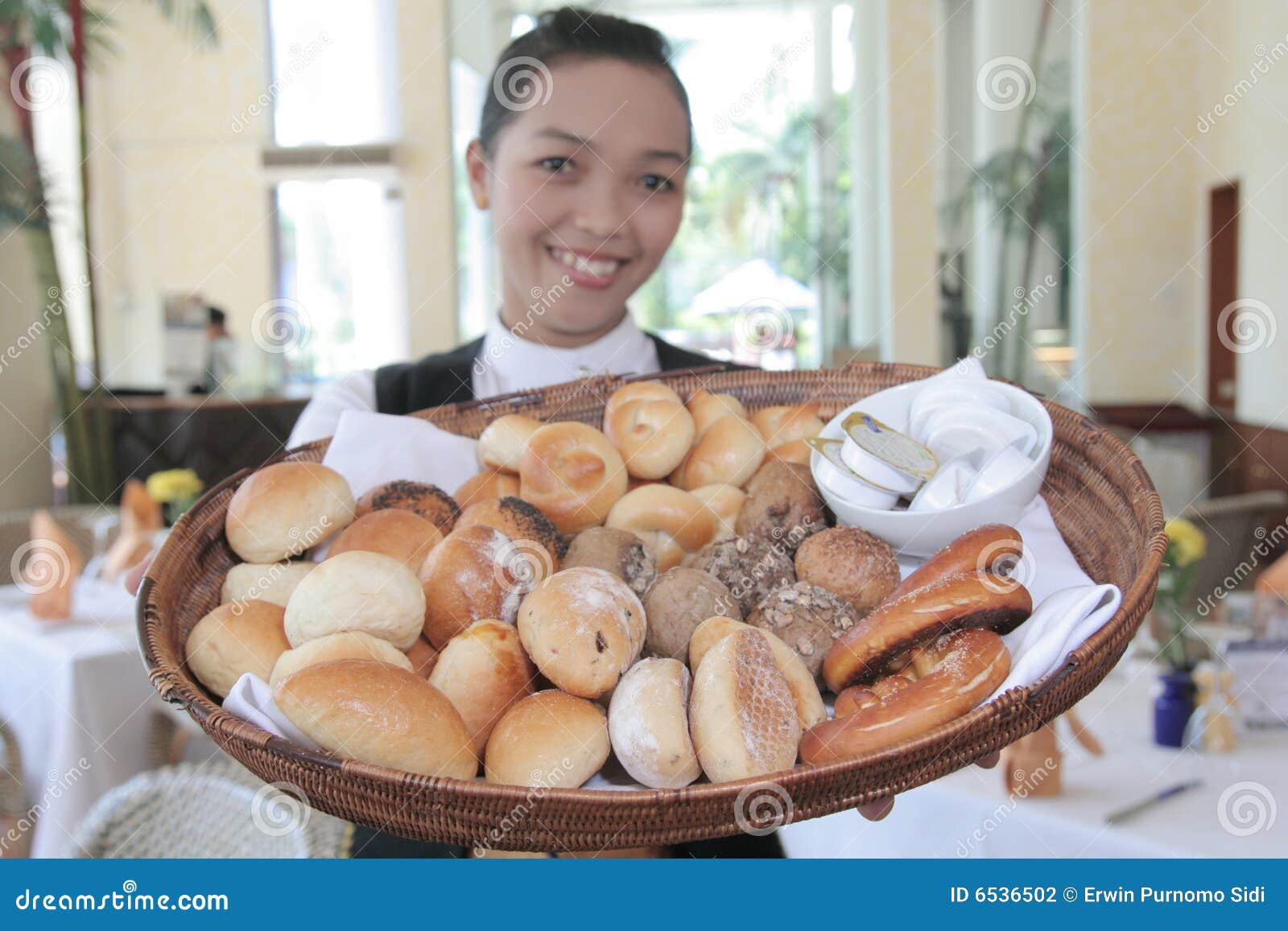 Waiter and Breads at Restaurant Stock Photo - Image of woman, bakery ...