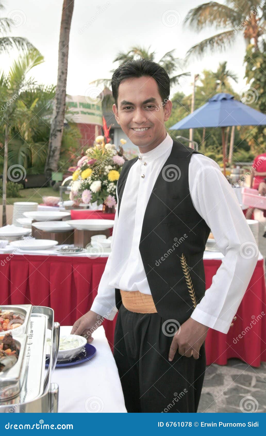 Waiter at buffet stock photo. Image of catering, hotel - 6761078